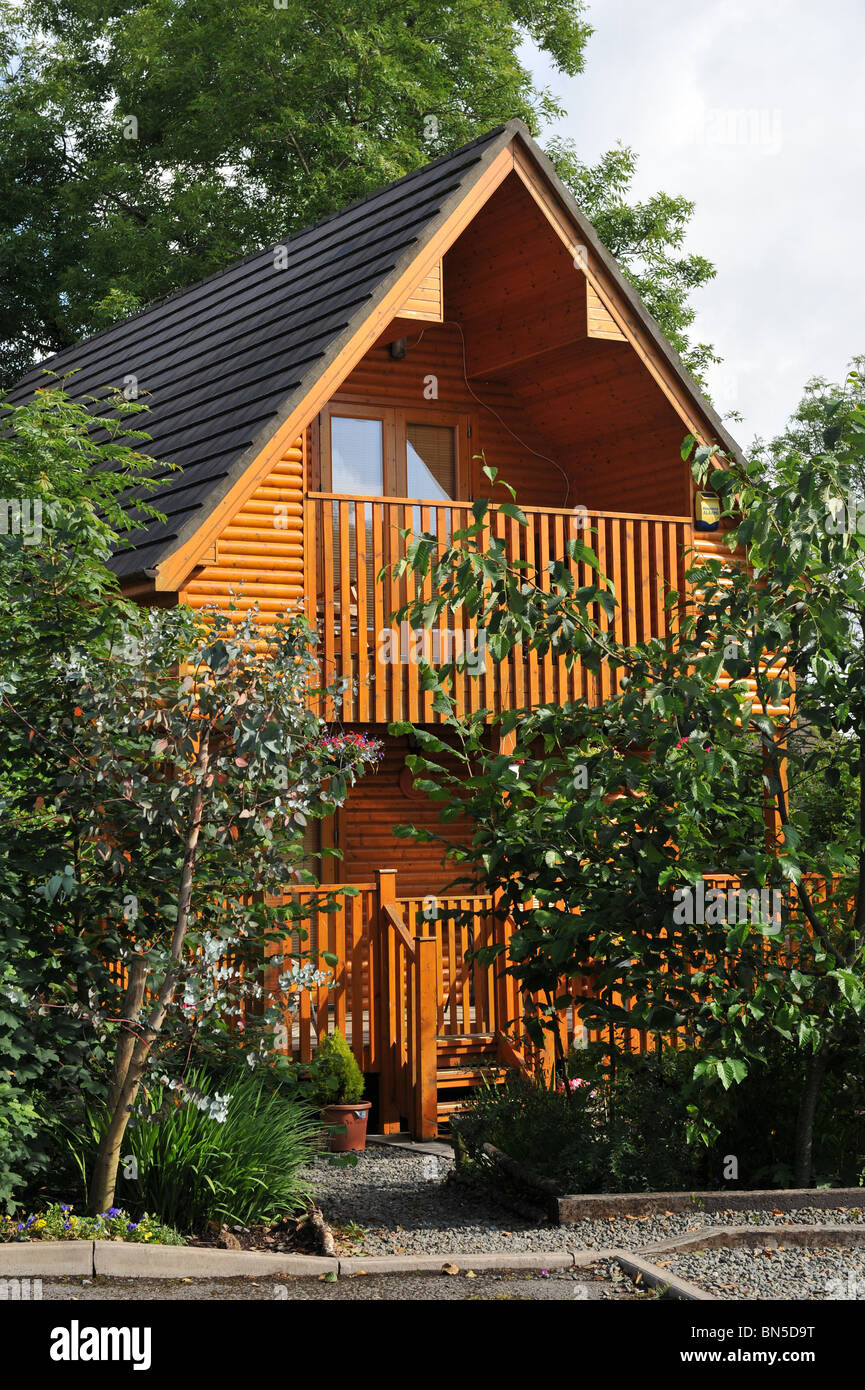 Small wooden countryside house in the forest Stock Photo - Alamy