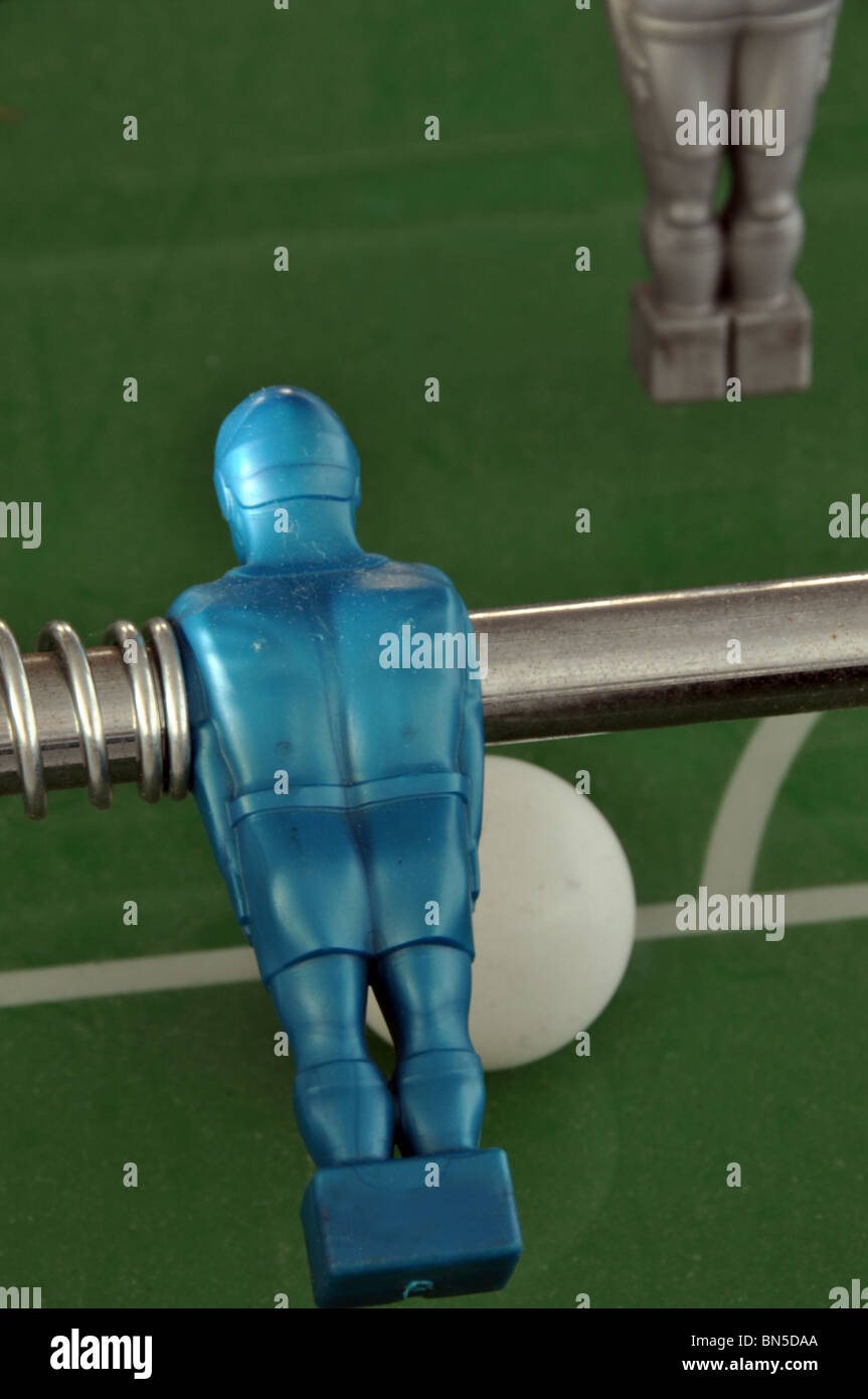 Closeup on foosball table with players, ball and central circle Stock ...
