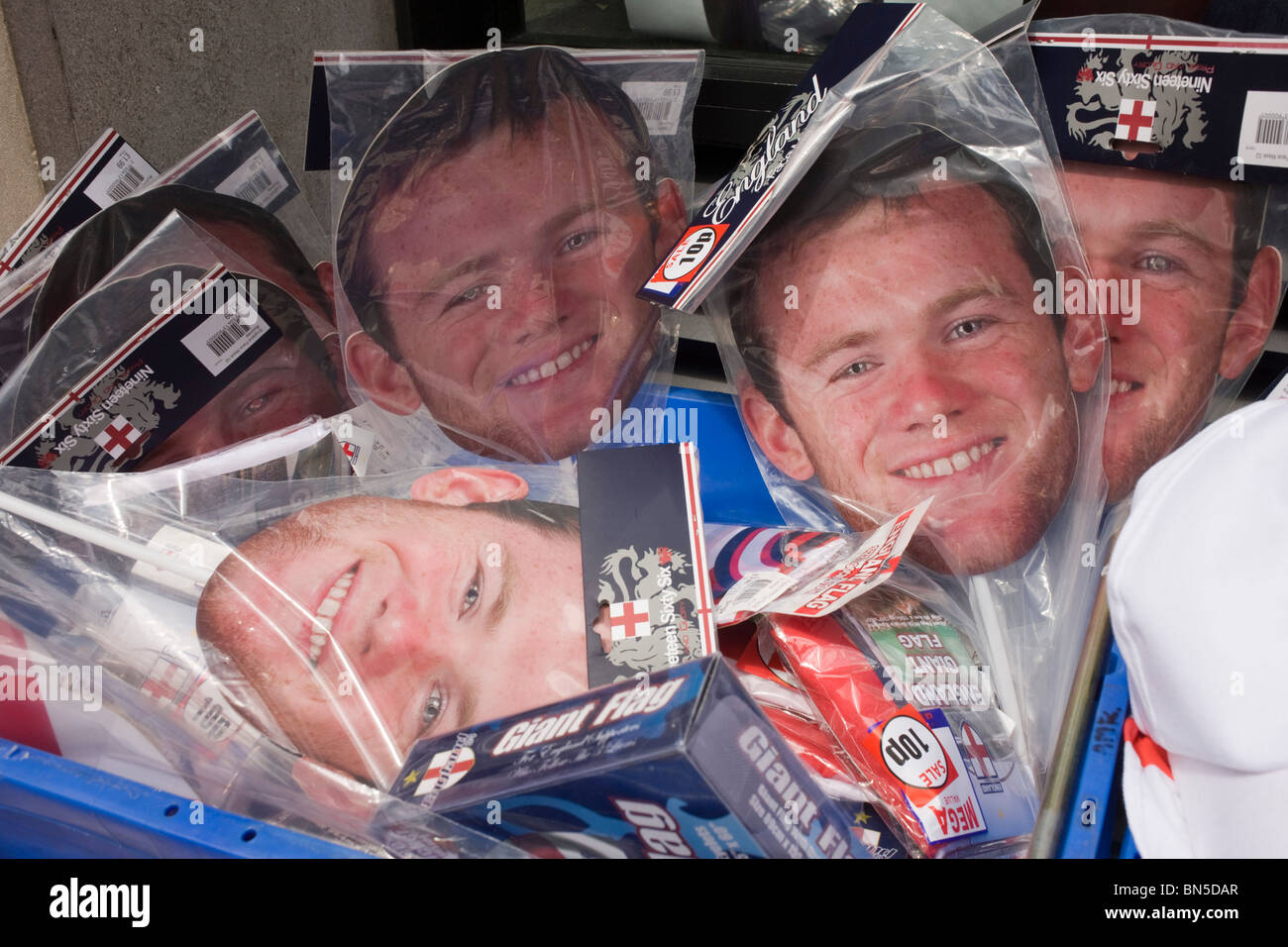 England footballer Wayne Rooney masks merchandise being sold off cheap ...