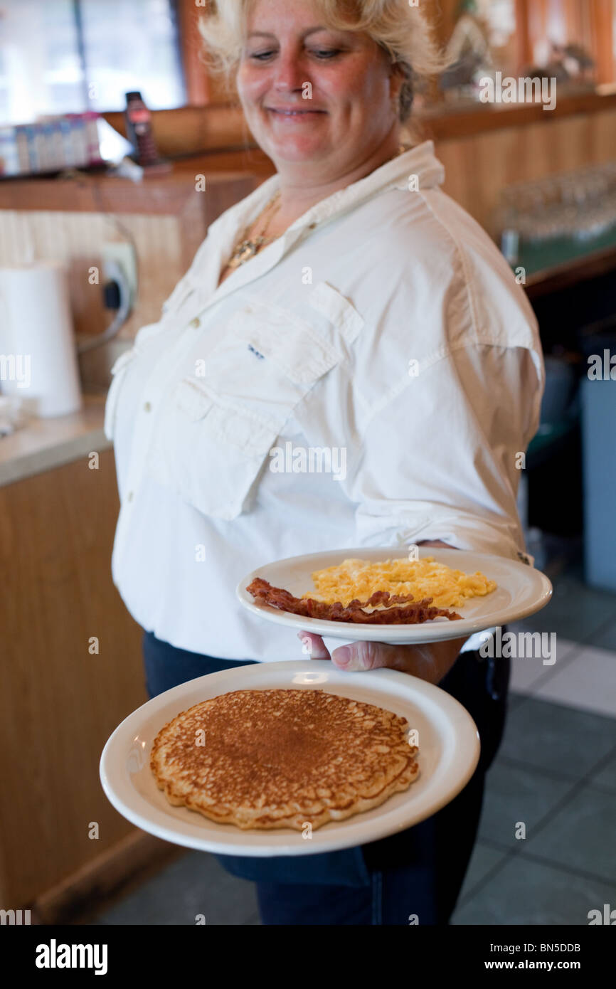 Waitress Renee Weeks Henry brings out breakfast orders at Backcountry ...