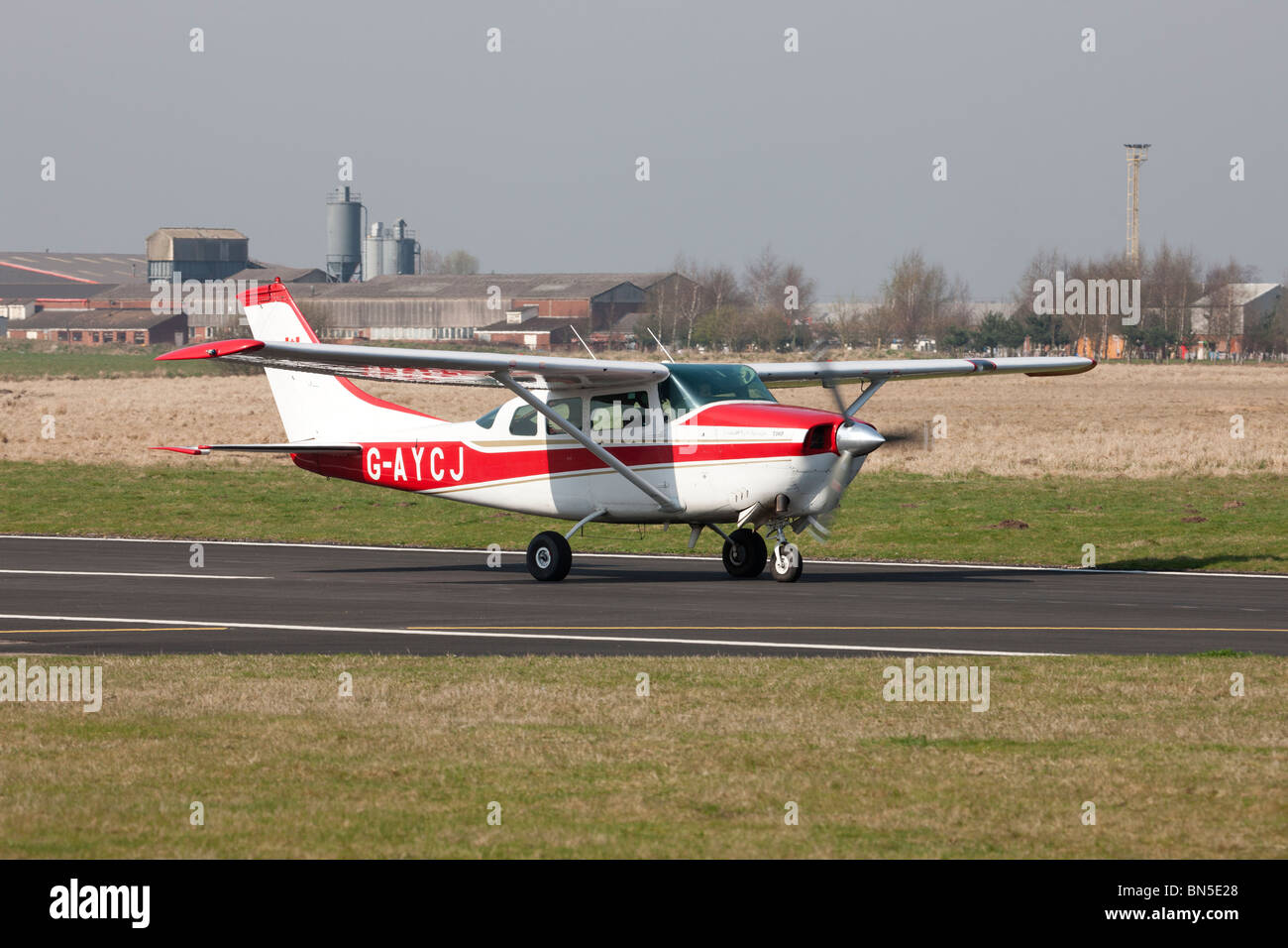 Cessna TP206D Super Skylane (Skywaggon) G-AYCJ taxiing along runway at ...
