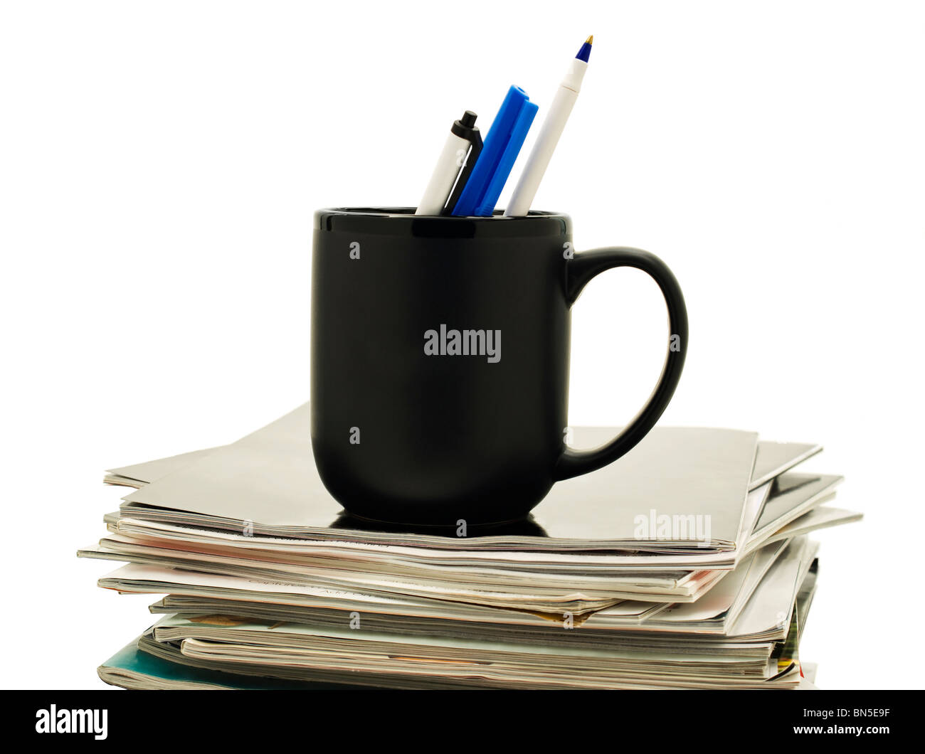 Magazine pile pens hi-res stock photography and images - Alamy
