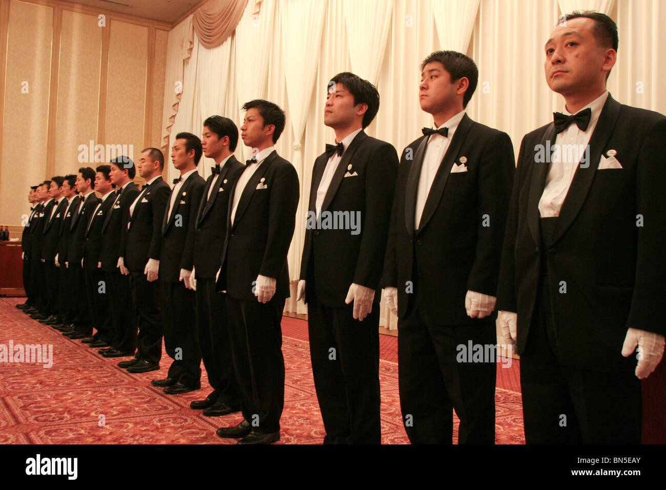 Japanese waiter service staff at a banquet for the Praemium Imperiale ...