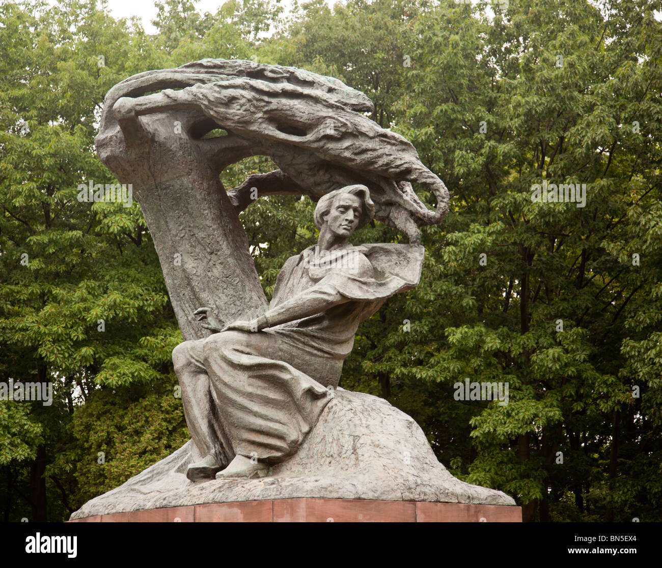 Carved statue of Frederick Chopin in Royal Park in Warsaw Poland Stock ...