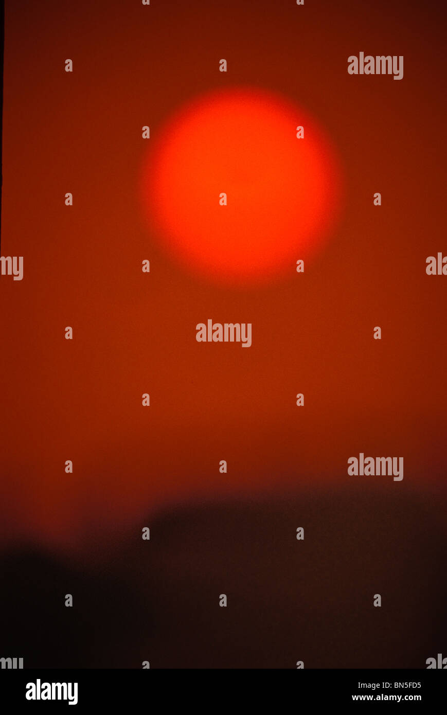 Bright red sunset warm warmth Stock Photo - Alamy