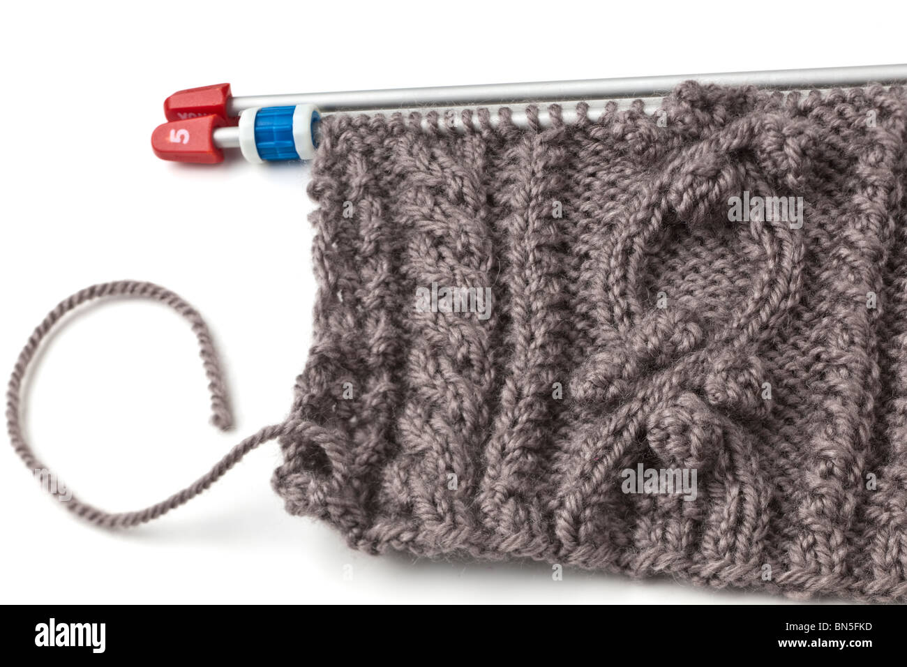 brown wool and aran pattern knitting Stock Photo - Alamy