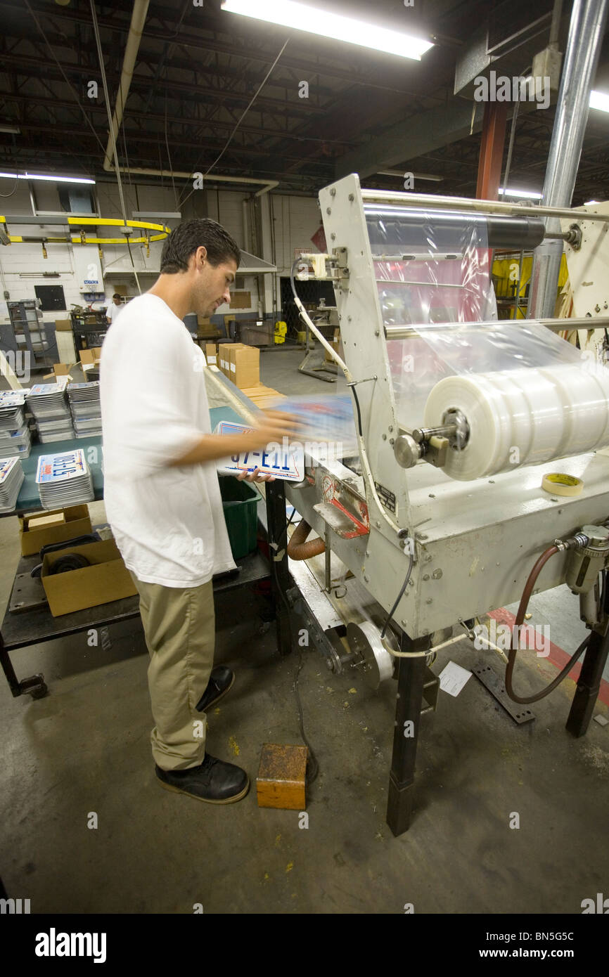 Inmate working in the license plate shop at the Nebraska State ...
