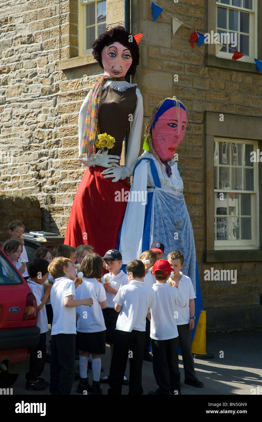 School children beneath giants. An exhibit at the Wray Scarecrow ...