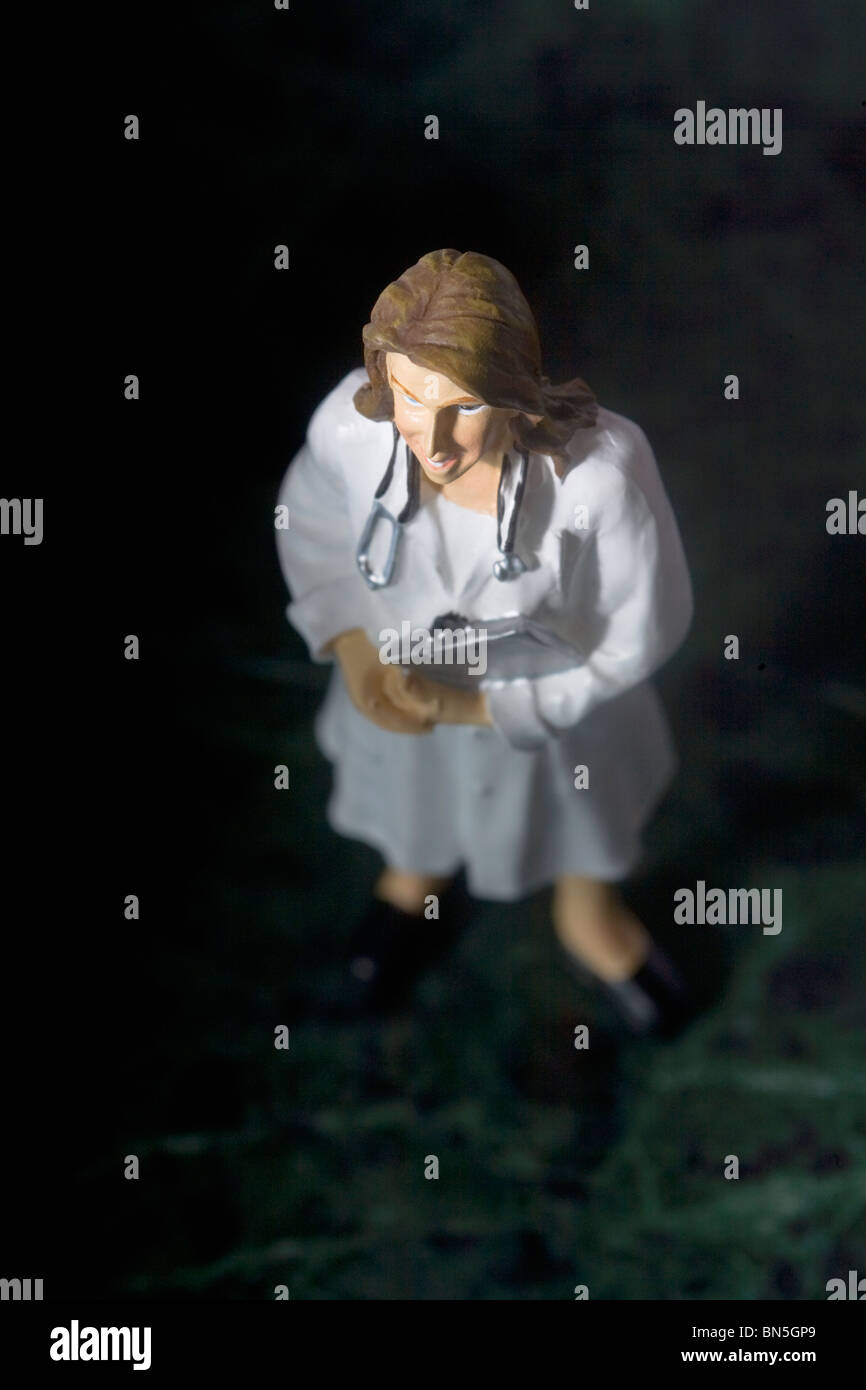 A female doctor figurine Stock Photo - Alamy