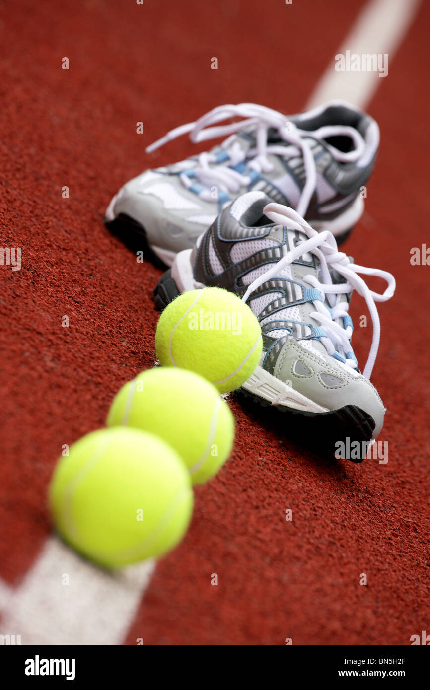 Red tennis shoes hi-res stock photography and images - Alamy