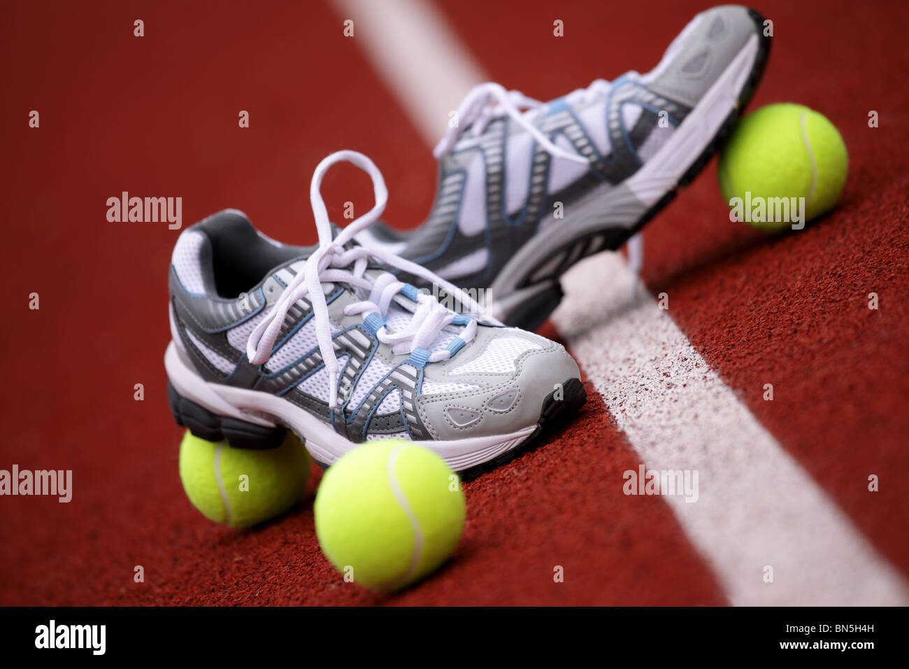 Red tennis shoes hi-res stock photography and images - Alamy