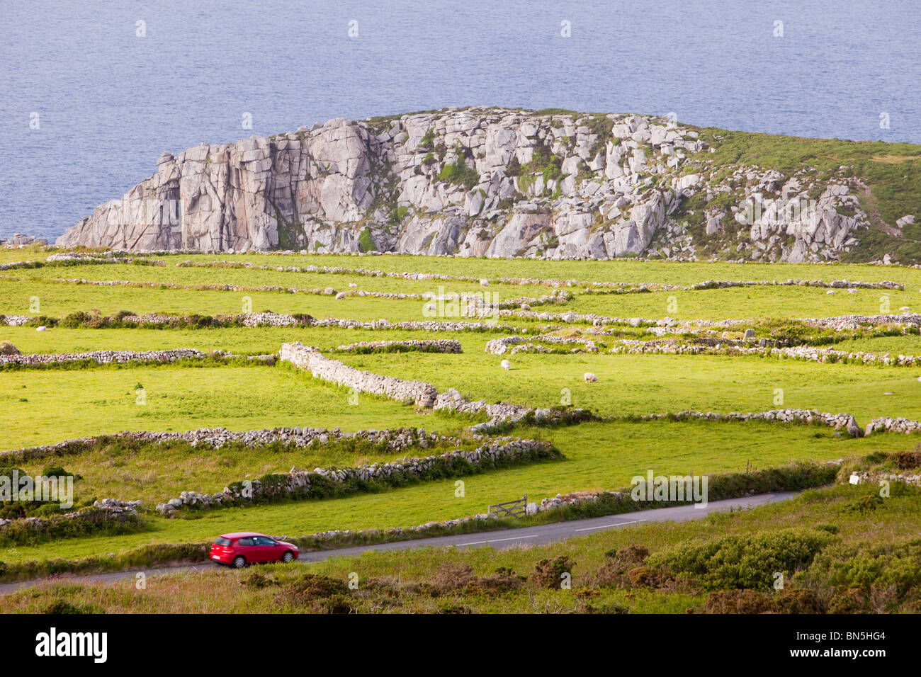 Ancient field boundaries and Bosigran cliff on the Cornwall coast, UK ...