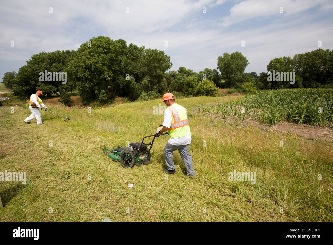 Inmates from work release (Community Corrections) mowing grass and ...