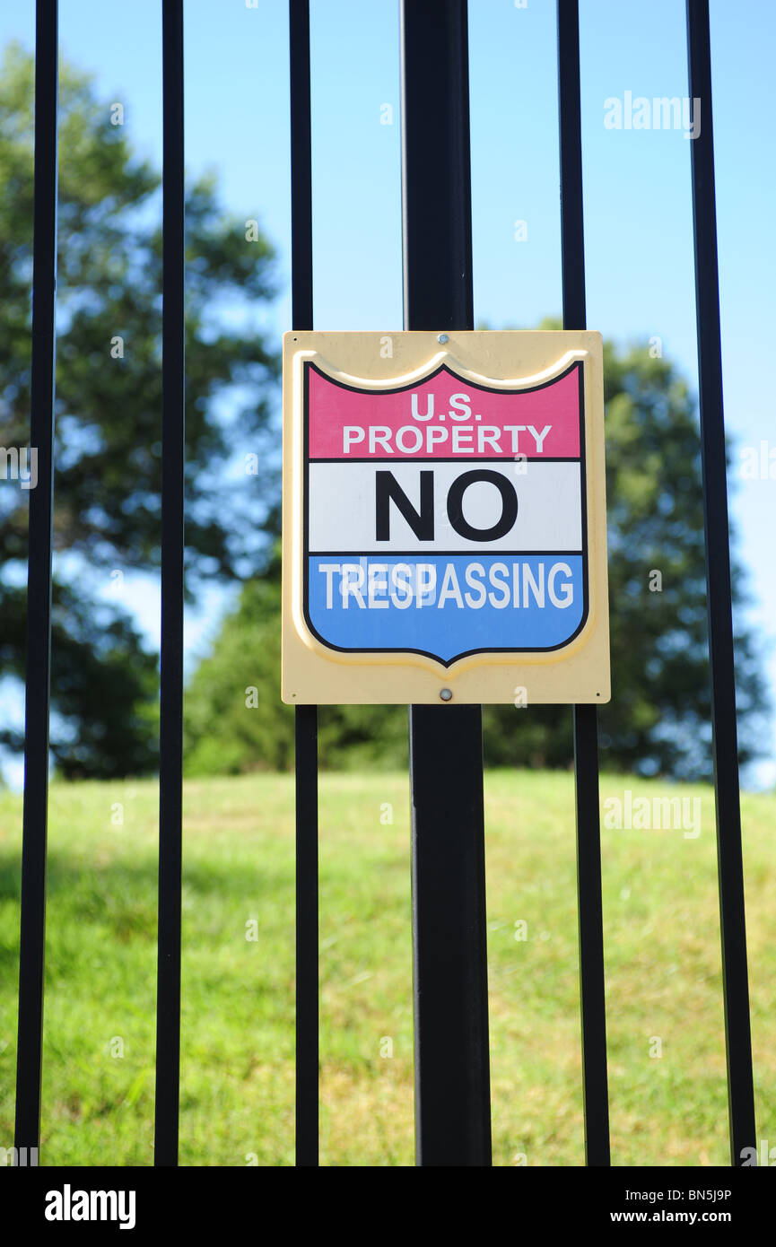 USA United States Government property no trespassing sign on fence of a ...