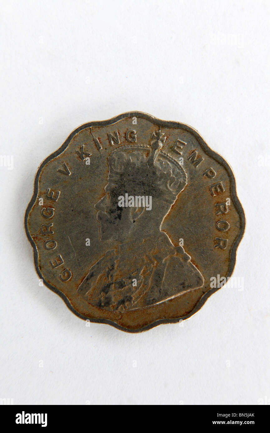 An Indian coin depicts the head of King-Emperor George V Stock Photo ...
