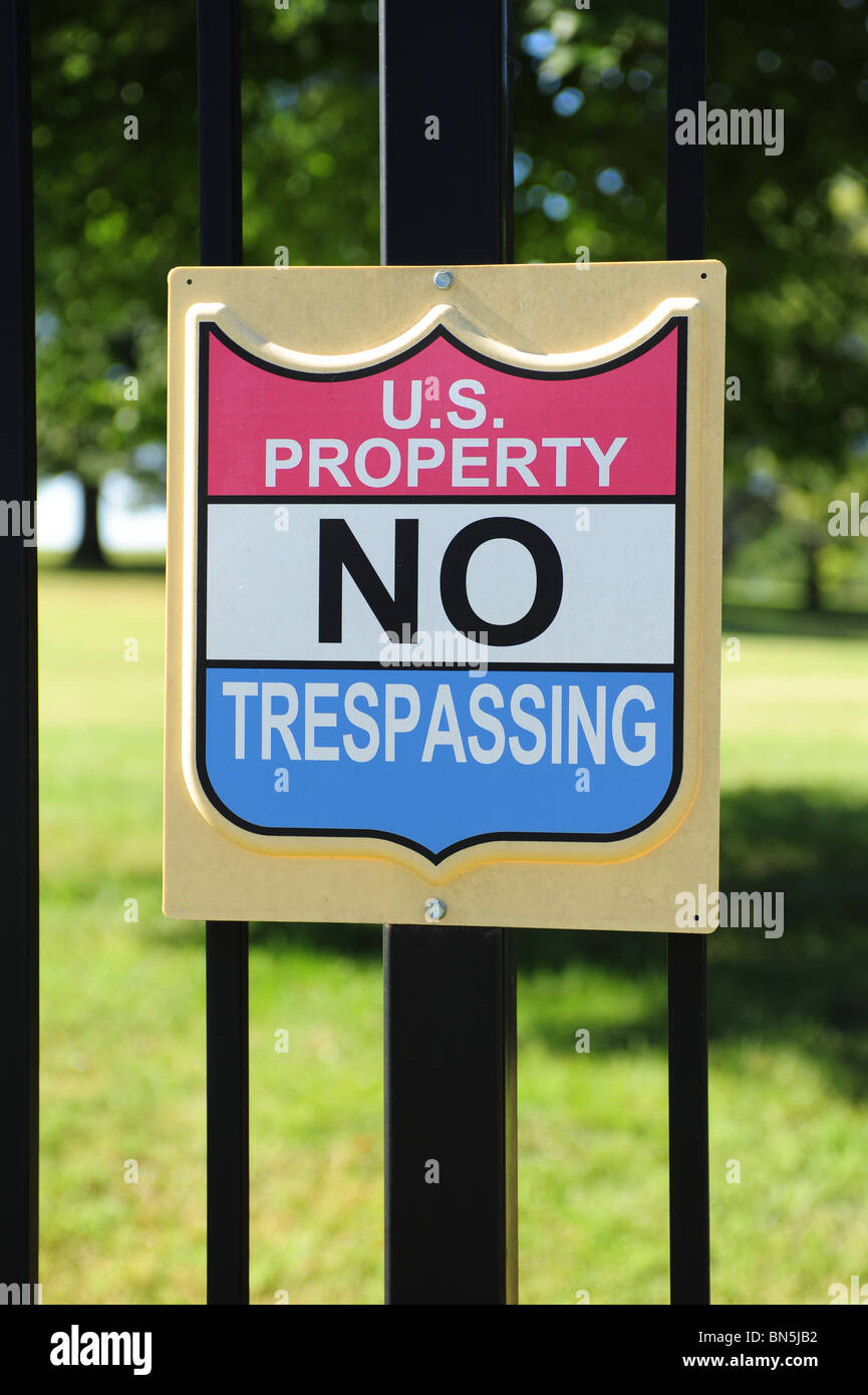 USA United States Government property no trespassing sign on fence of a ...