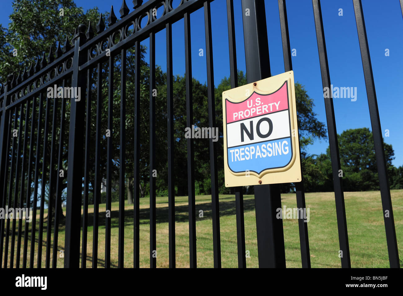 USA United States Government property no trespassing sign on fence of a ...