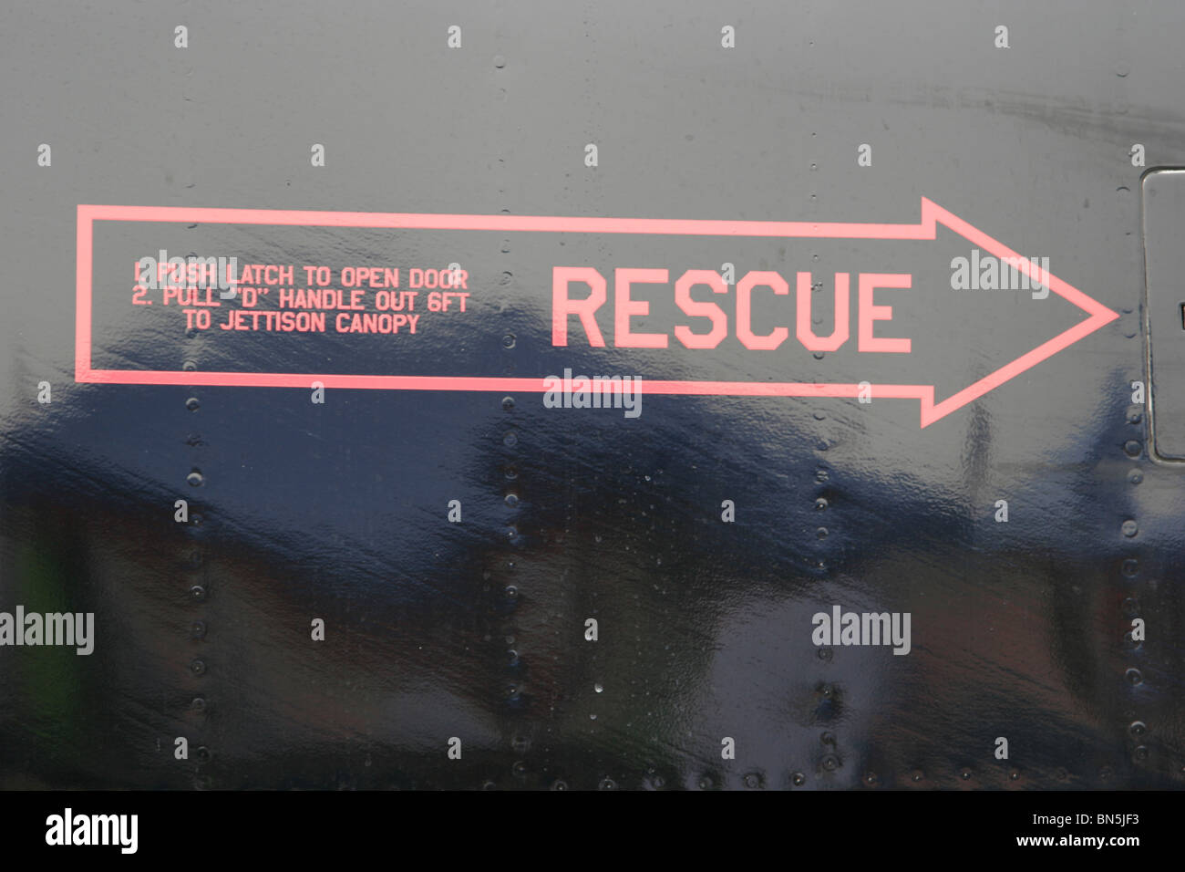Red lettering on a US Air Force jet Stock Photo - Alamy
