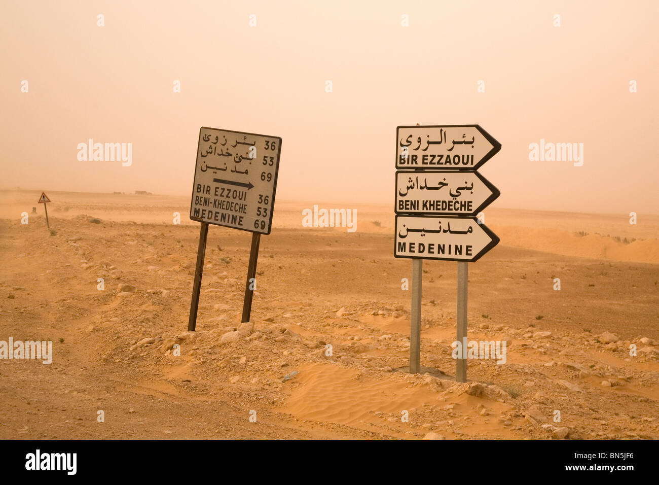 Road signs in the Sahara Desert are written with Arabic and Latin ...