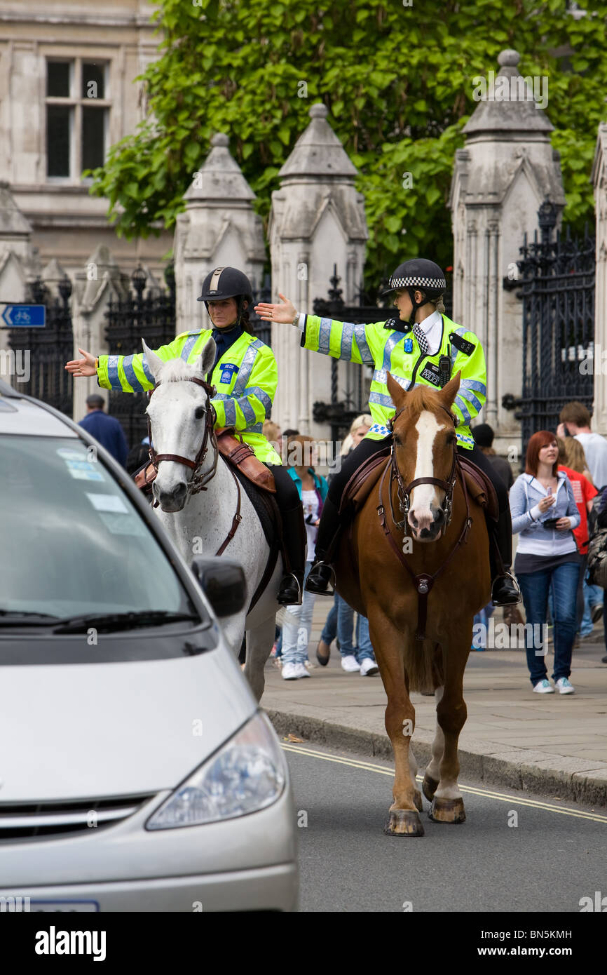 Two female mounted police officers, one of them a support officer, on ...