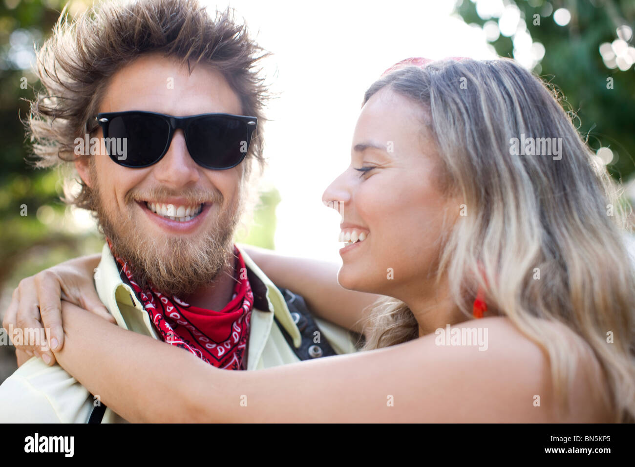 Caucasian couple hugging Stock Photo - Alamy