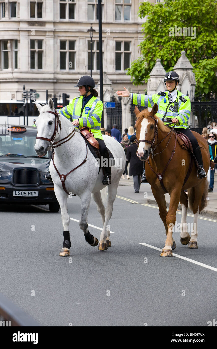 Two female mounted police officers, one of them a support officer, on ...