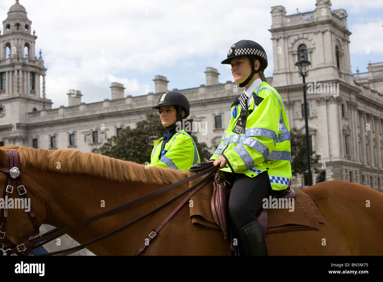 Two female mounted police officers, one of them a support officer, on ...