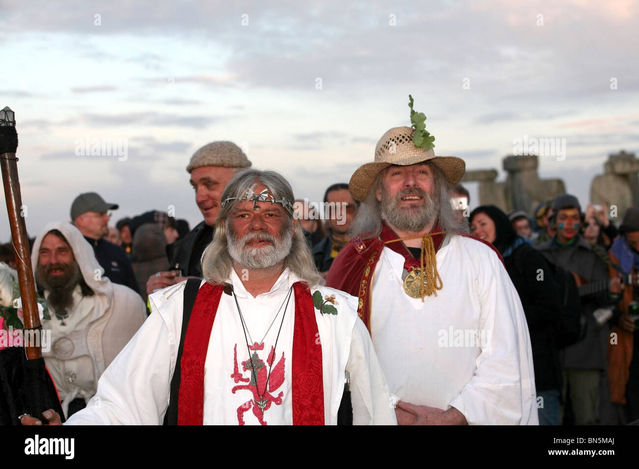 Druids watching the sunrise summer solstice at Stonehenge Stock Photo ...
