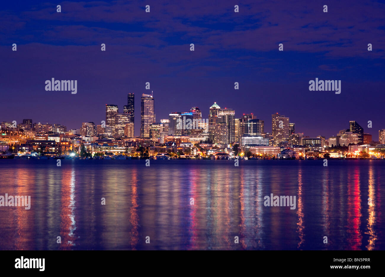 A Nighttime Seattle Skyline of Elliot Bay in the Puget Sound Stock ...