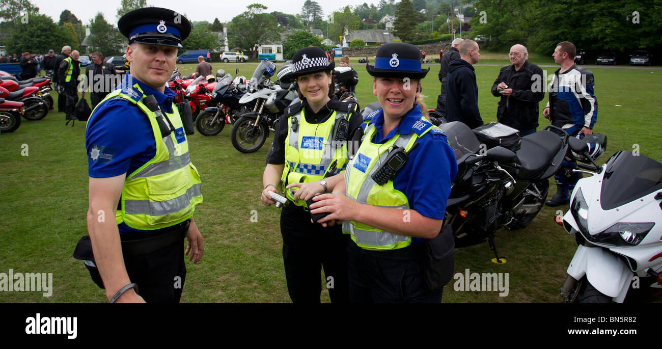 Community police officer & young female PC enjoying their works at a ...