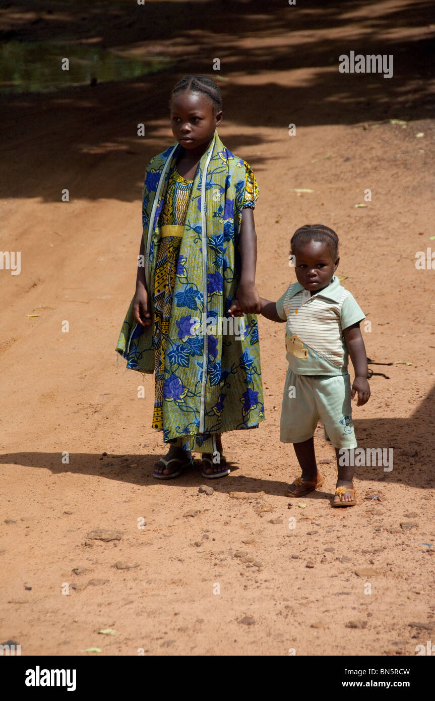 Africa, Benin, Ouidah. Everyday life on the streets of Ouidah. Children ...