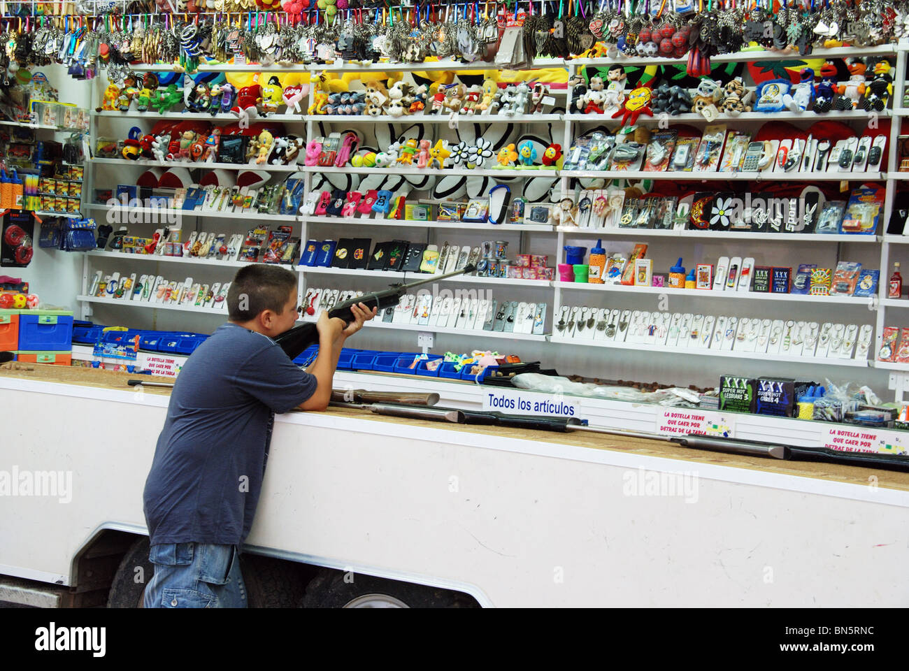 Fairground shooting range hi-res stock photography and images - Alamy
