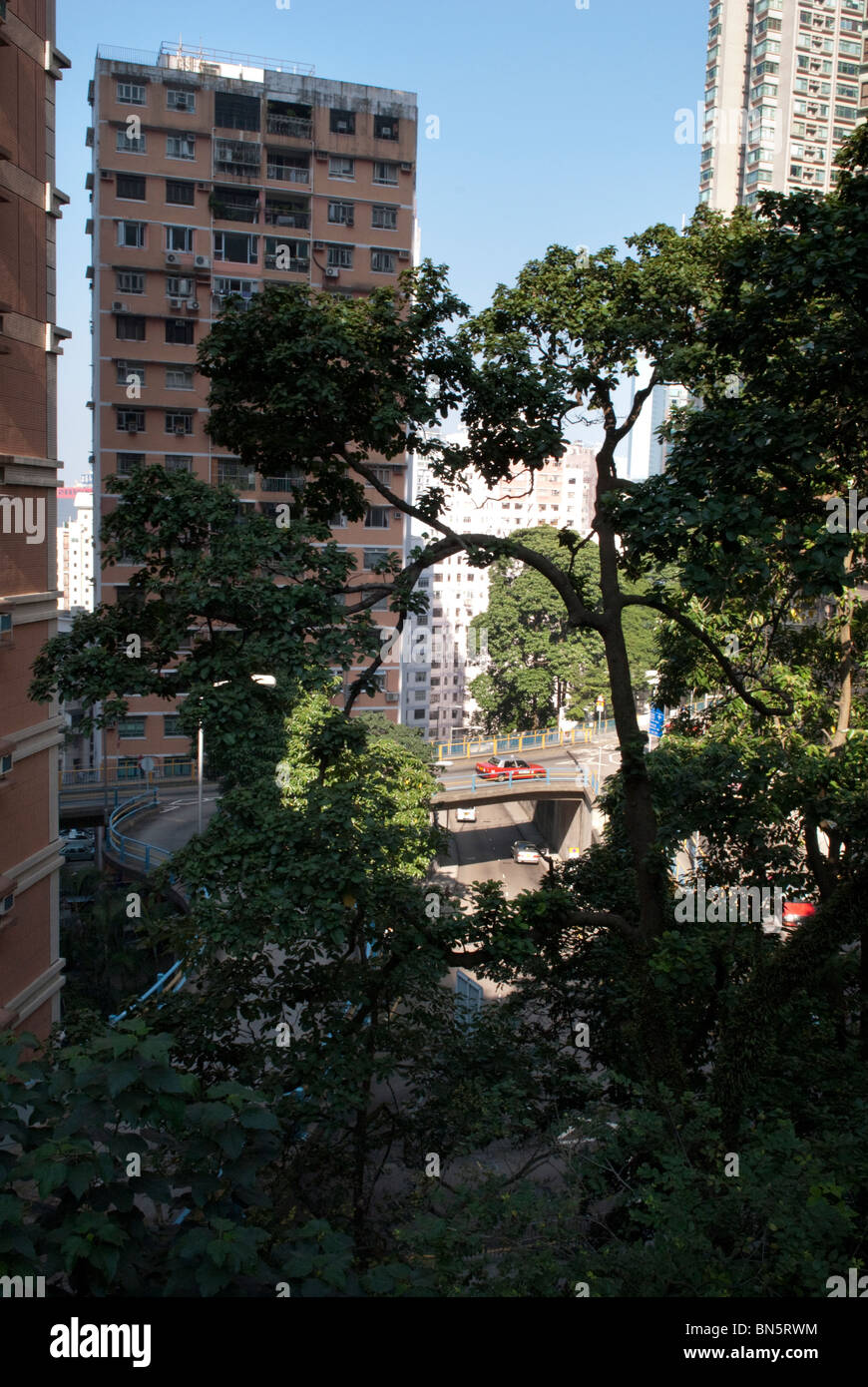 Hill side scene in Mid-level Hong Kong. Steep hill side with high rises ...