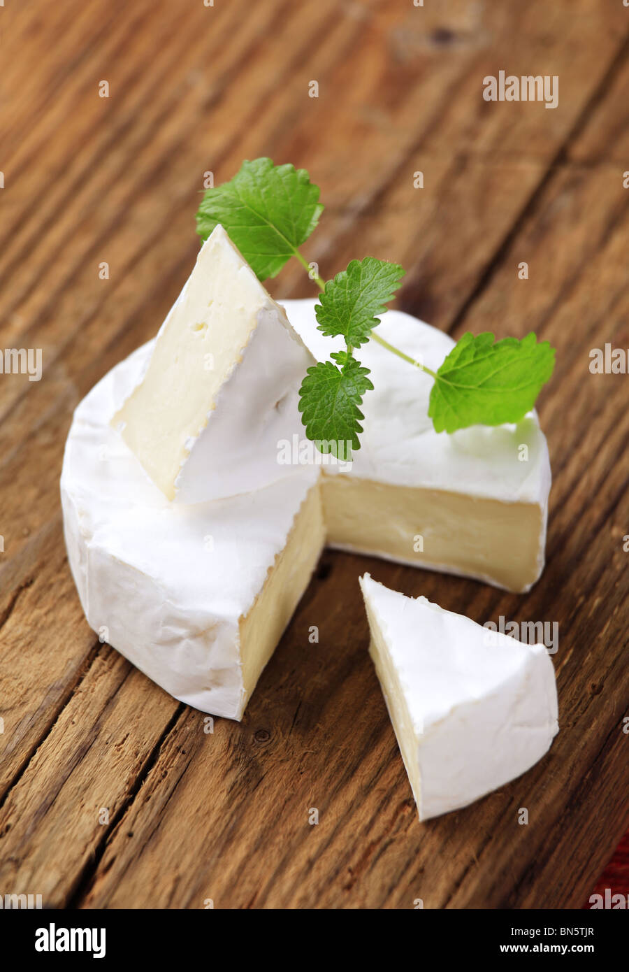 Soft cheese with edible white rind Stock Photo - Alamy