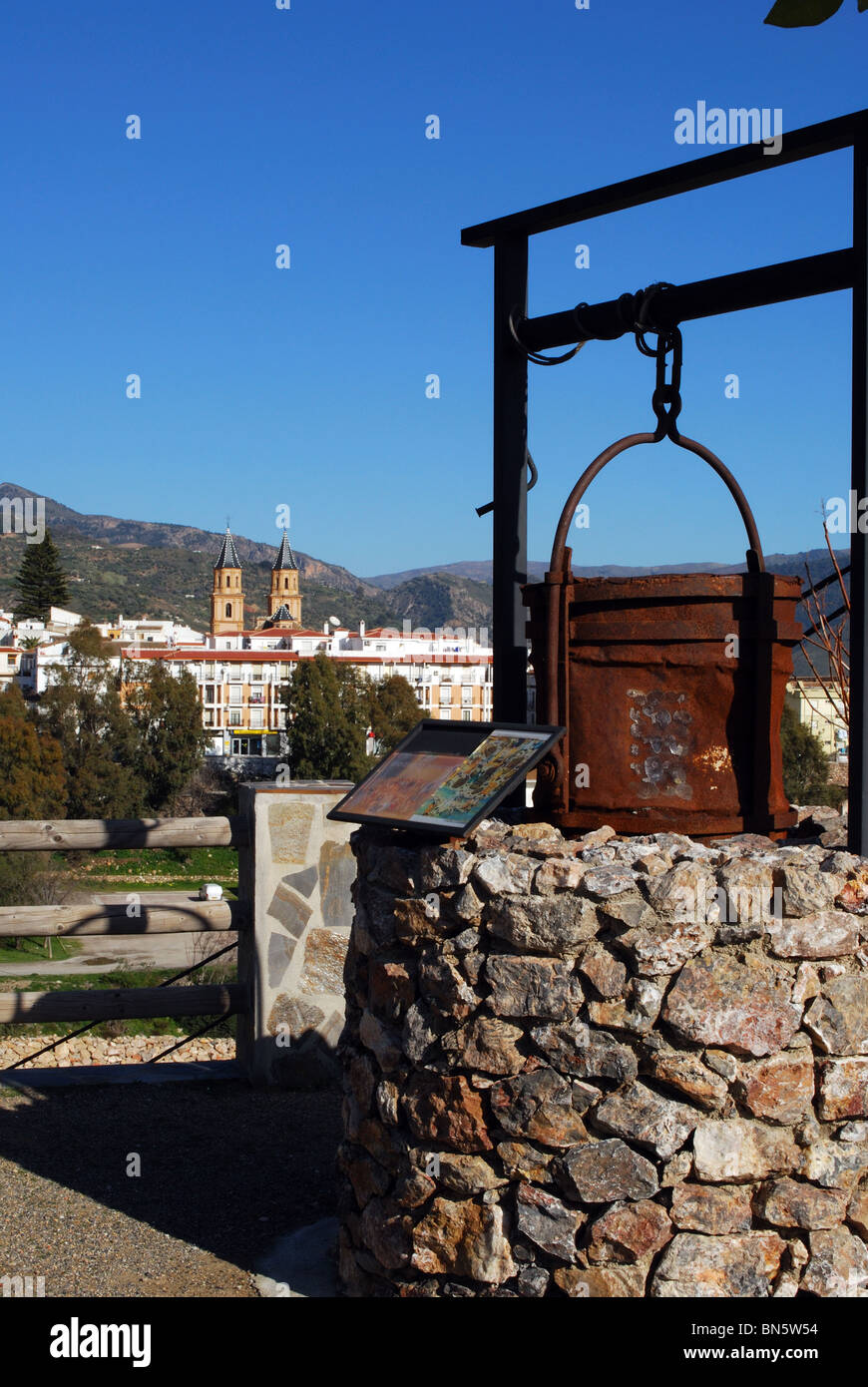Water well with a view of the town and Church, Orgiva, Las Alpujarras ...