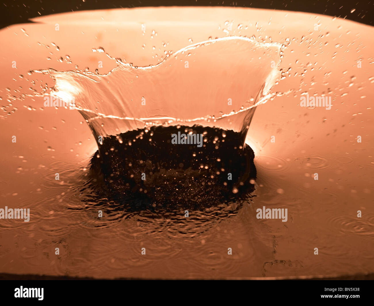Water splash that will form the rise Stock Photo - Alamy