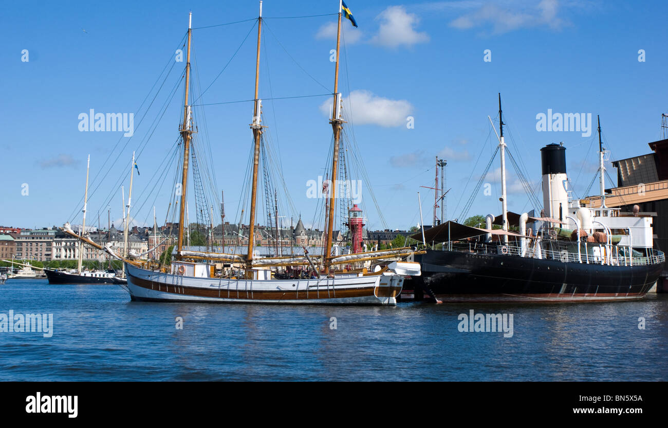 Old steam and sailing ships docked adjacent to the Vasa museum in ...