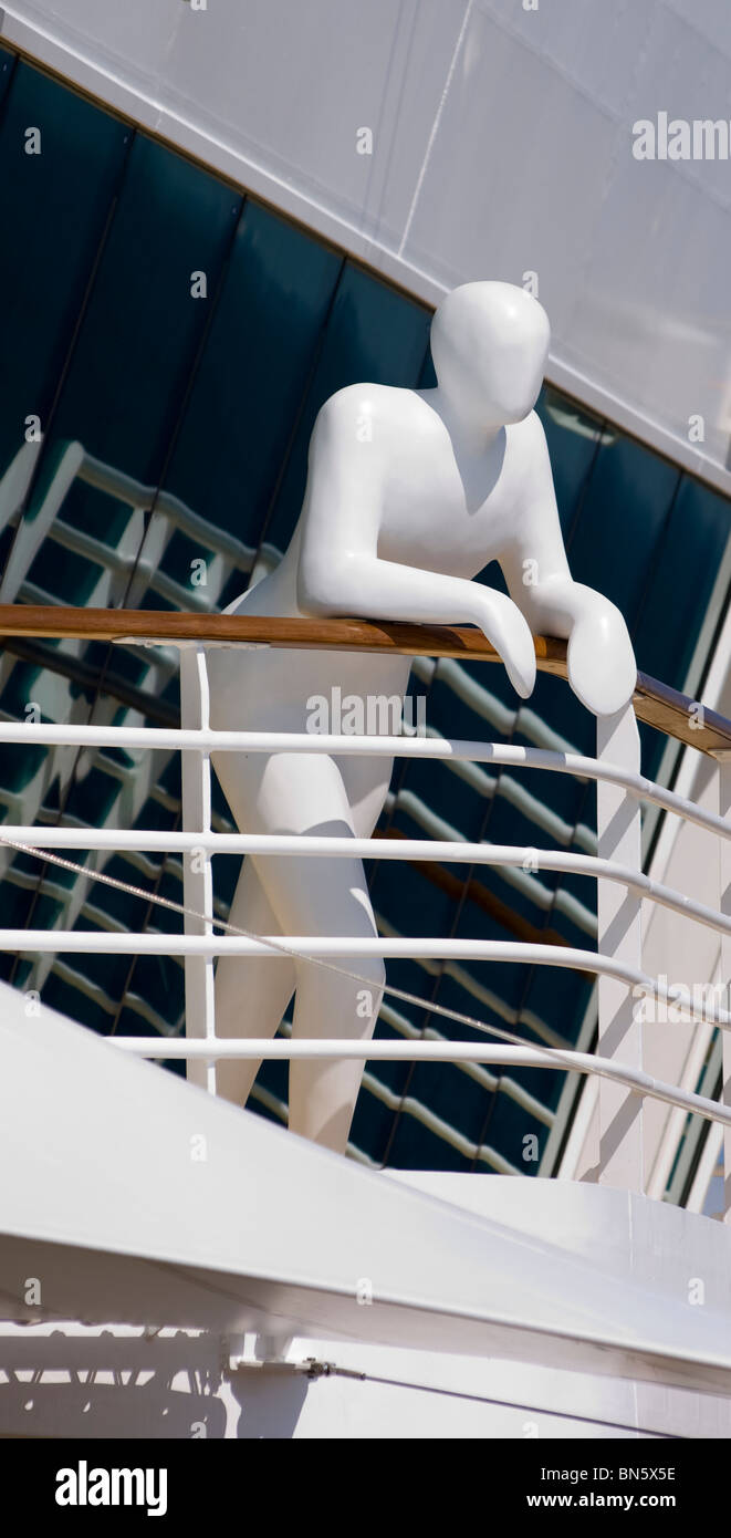 A white figure leaning on a railing on board the P&O cruise ship Azura ...