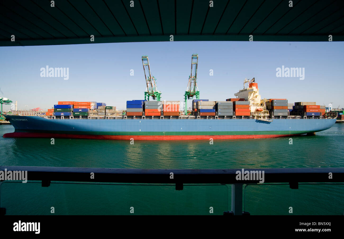 looking at cargo freighter from stateroom on cruise ship Stock Photo ...