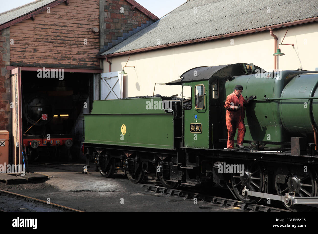 Steam train maintenance, Minehead Railway Station Stock Photo - Alamy