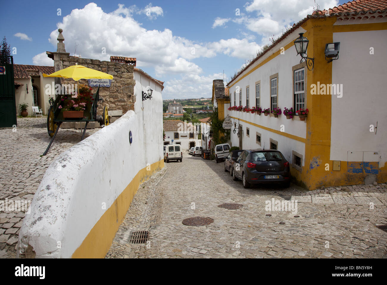 Medieval cobblestone street fortified village hi-res stock photography ...