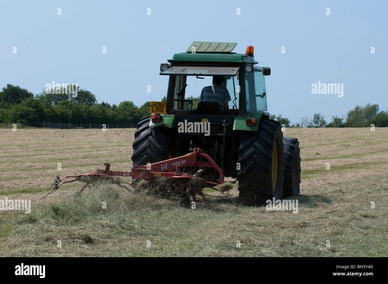 Hay turner hi-res stock photography and images - Alamy