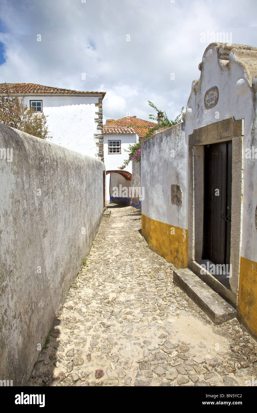 Medieval cobblestone street fortified village hi-res stock photography ...