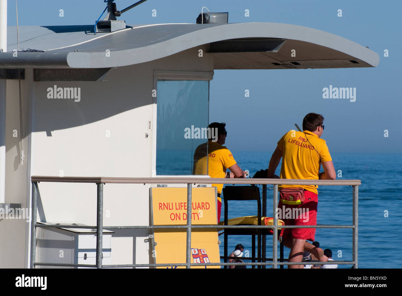 RNLI lifeguards on duty at Bournemouth Beach Stock Photo - Alamy