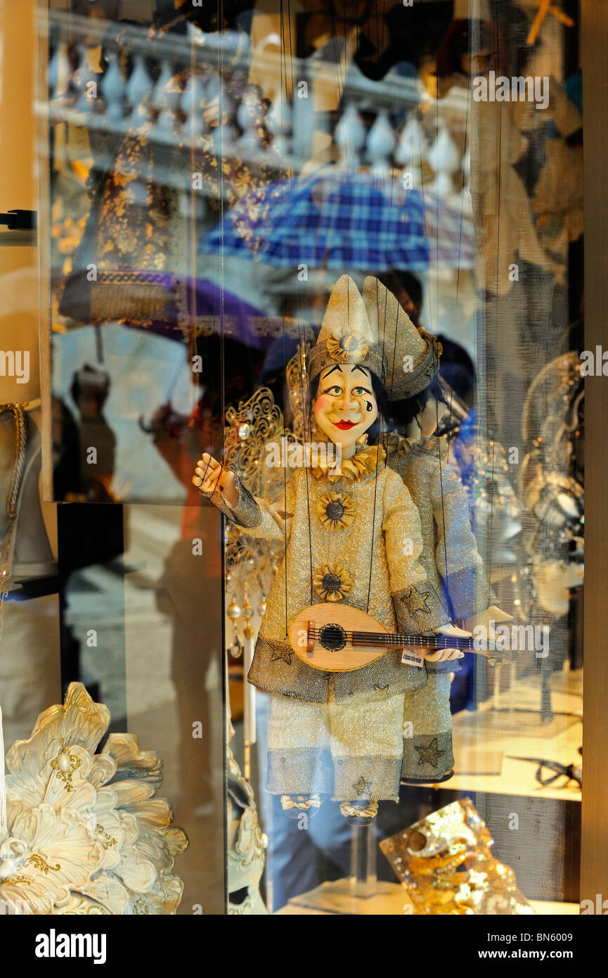 A clown puppet striking a pose in a window display on Riva del Vin in ...