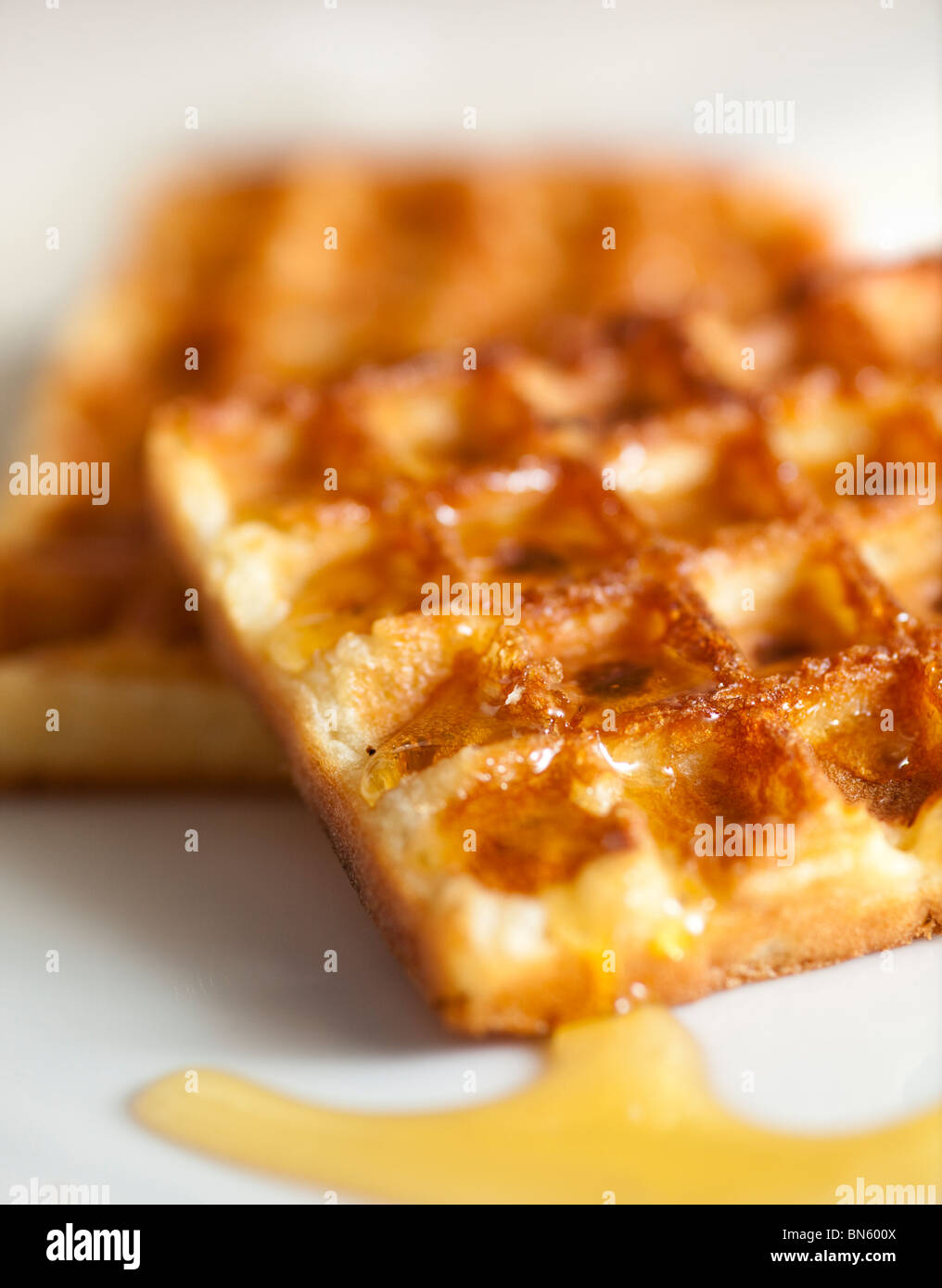 Toasted Waffles with Golden syrup Stock Photo - Alamy