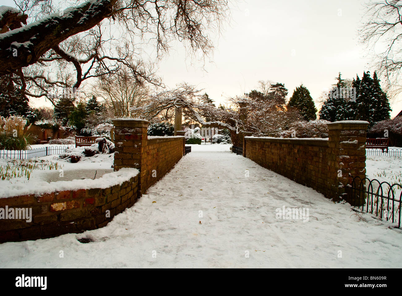 Path in the snow Stock Photo - Alamy