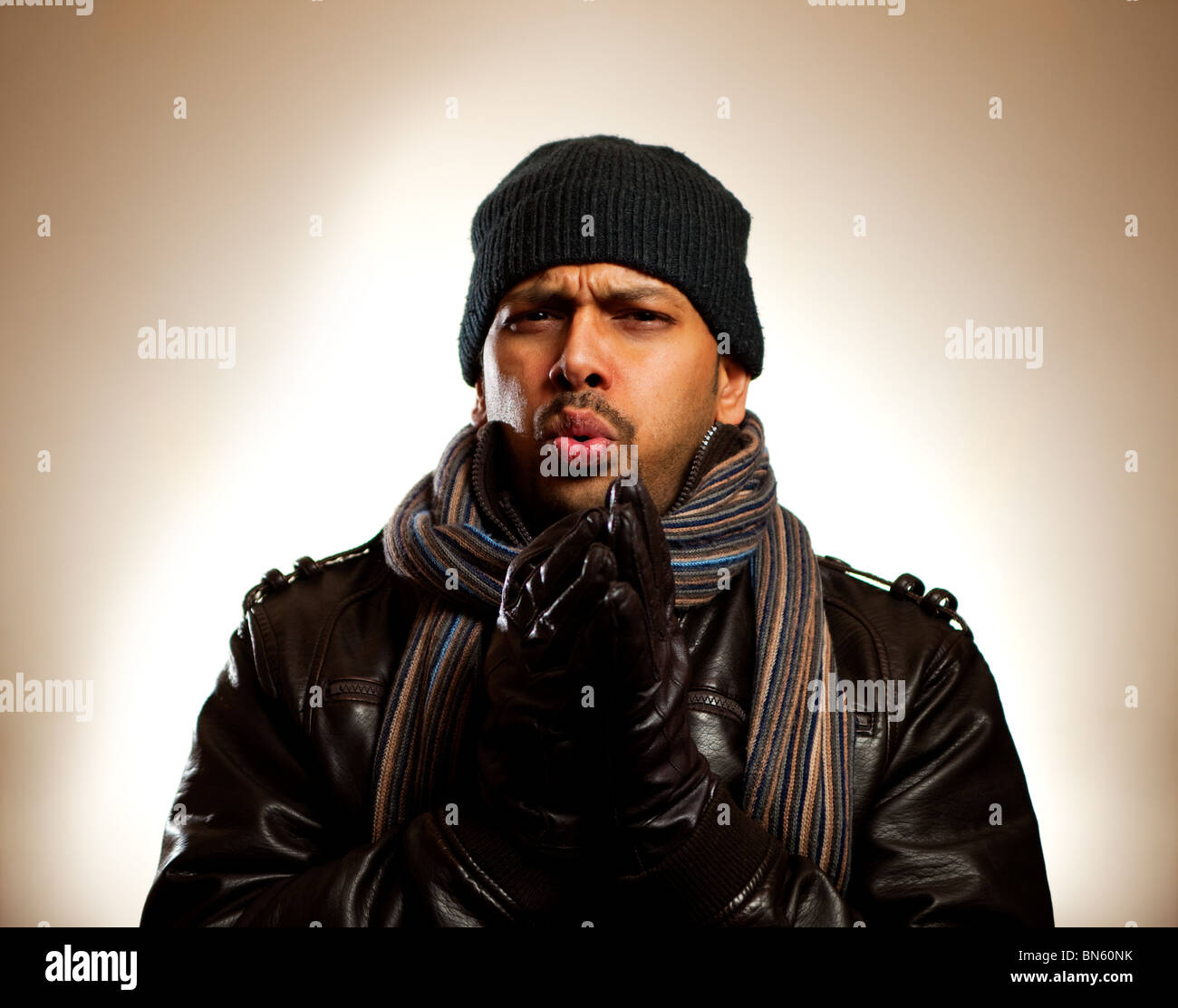 Male model covered up for the cold Stock Photo - Alamy