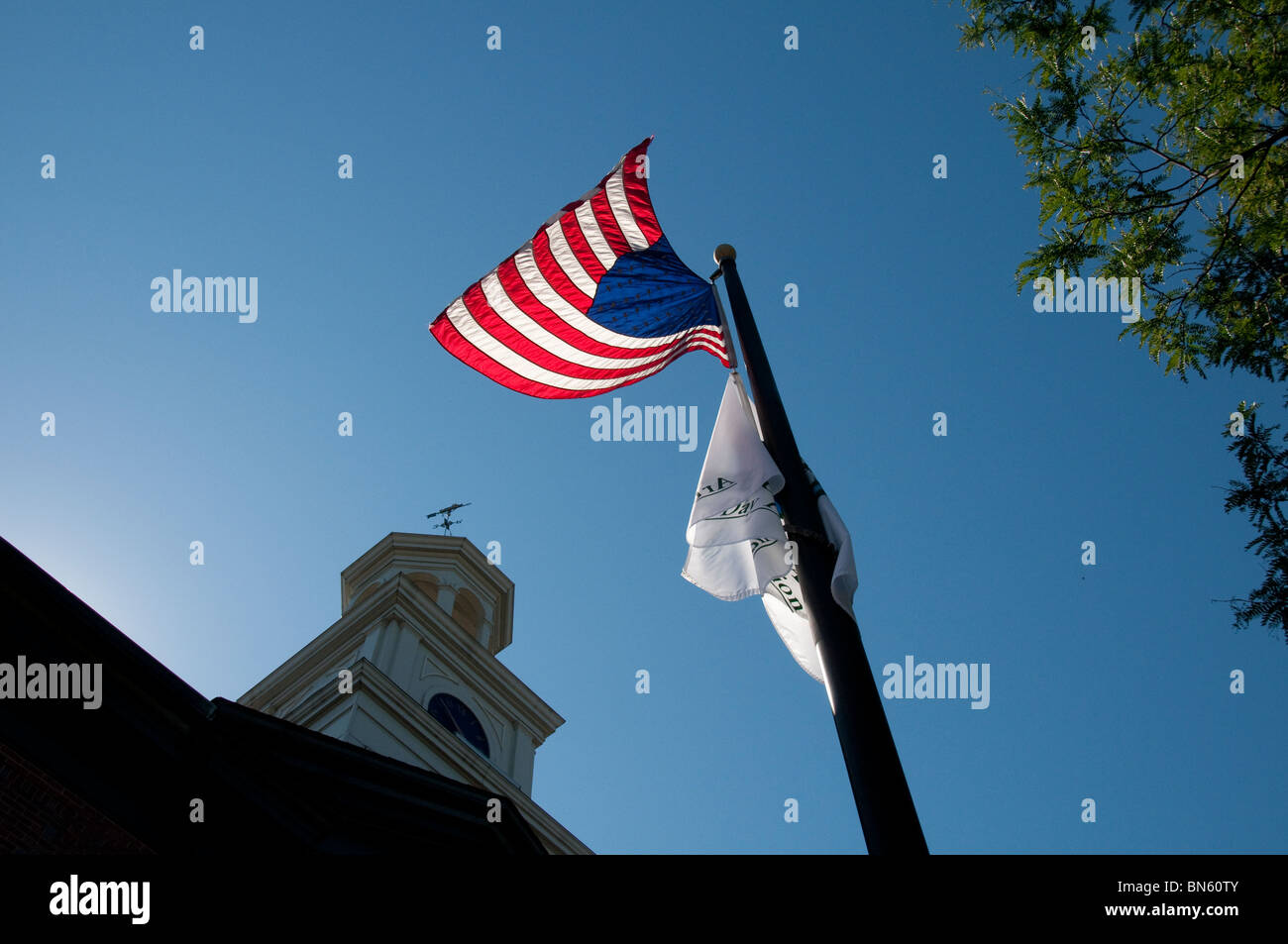 American flag blowing proudly Stock Photo - Alamy