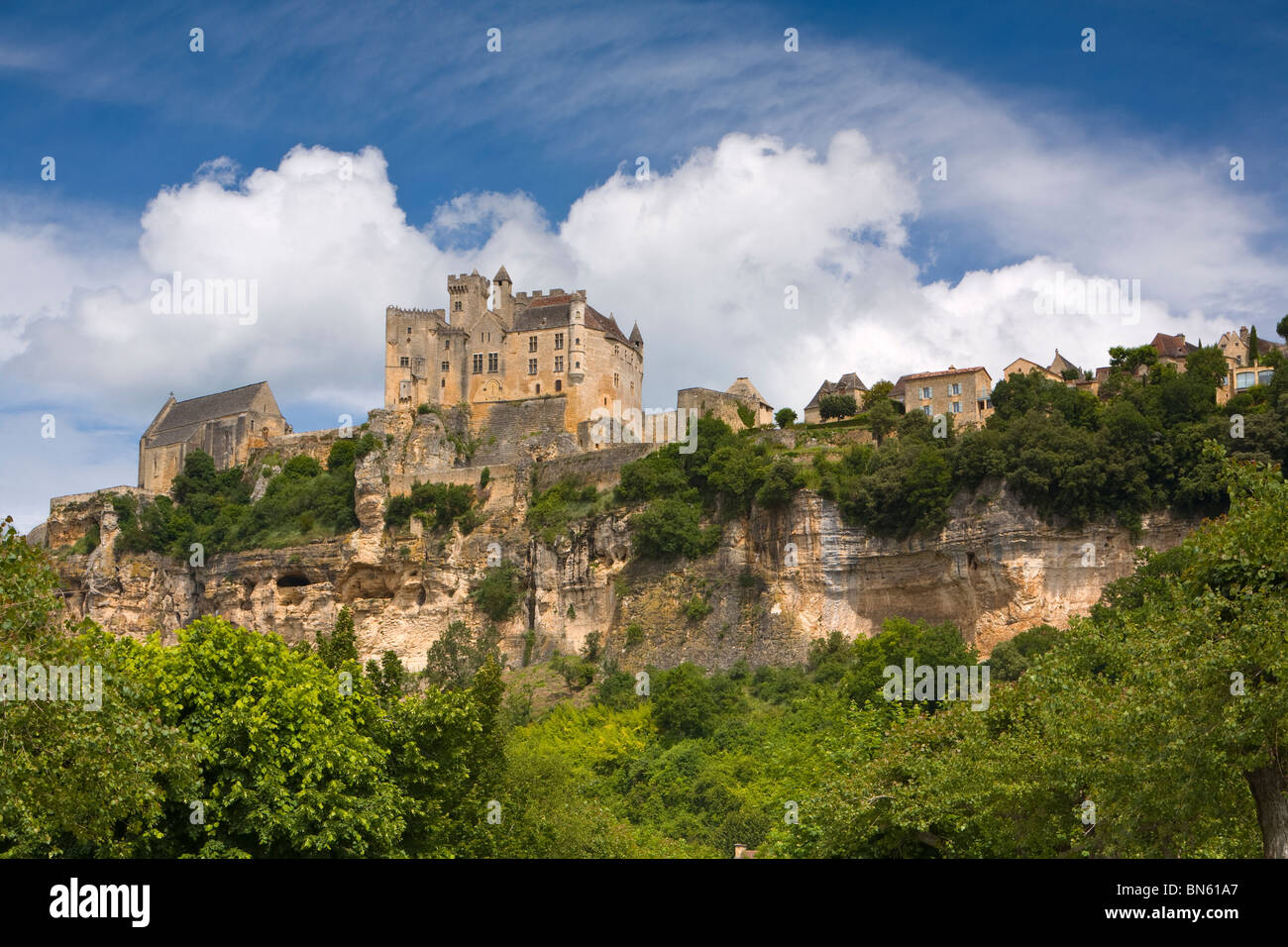 The imposing form of the Chateau at Beynac-et-Cazenac stands watch over ...